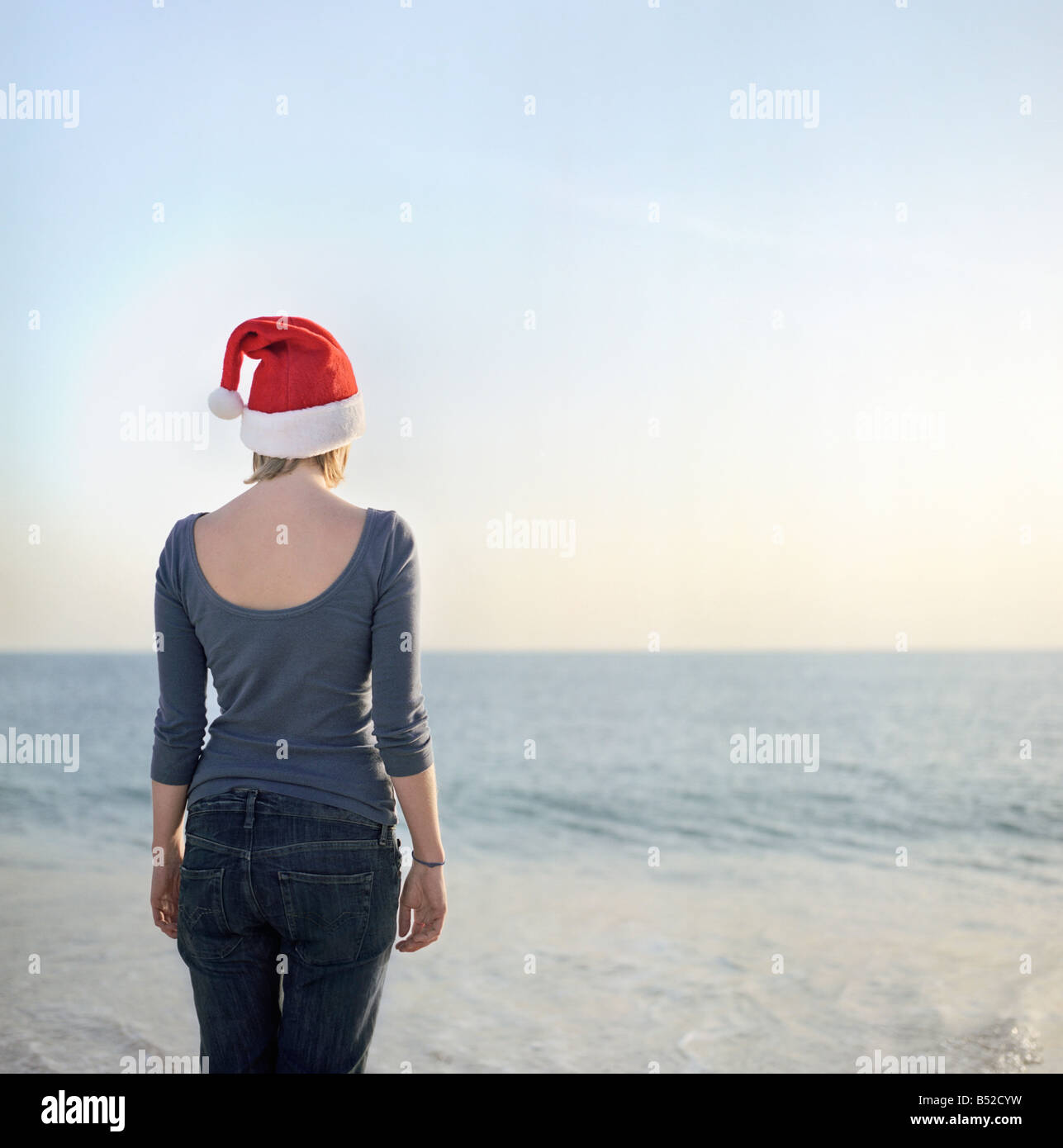 Woman Santa Hat Rear View High Resolution Stock Photography and Images ...