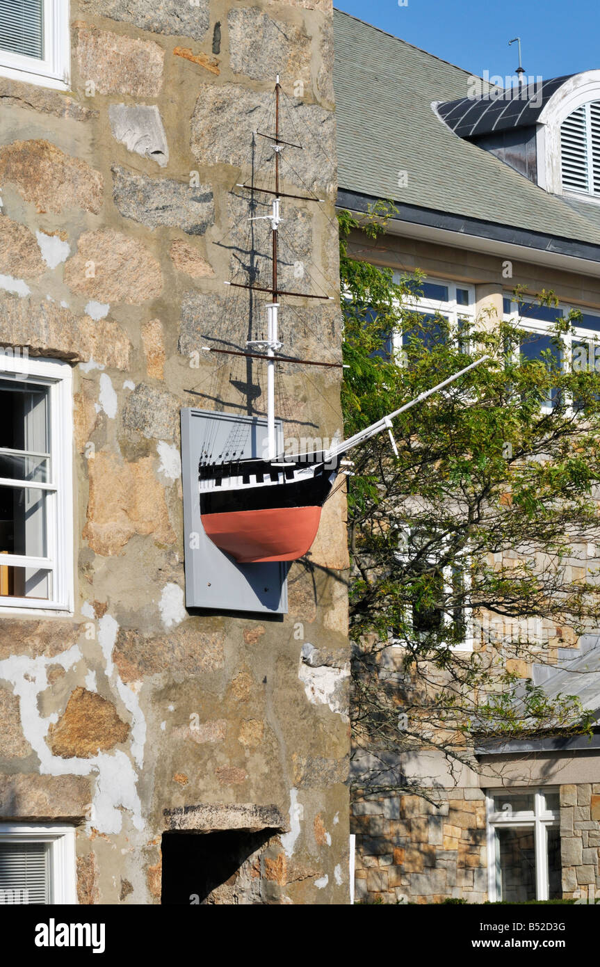 Ship half hull mounted on old stone building in Woods Hole, Falmouth ...