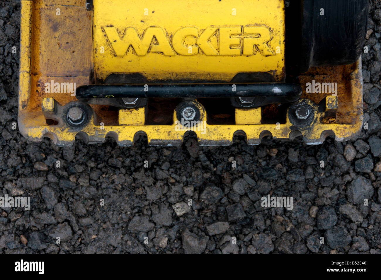 Wacker plate on hardcore Stock Photo - Alamy
