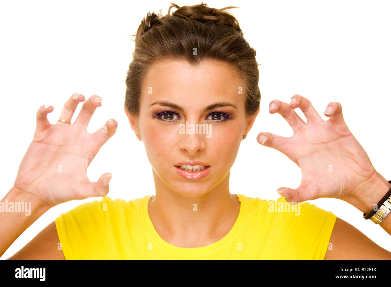 Young woman clawing her face hi-res stock photography and images - Alamy