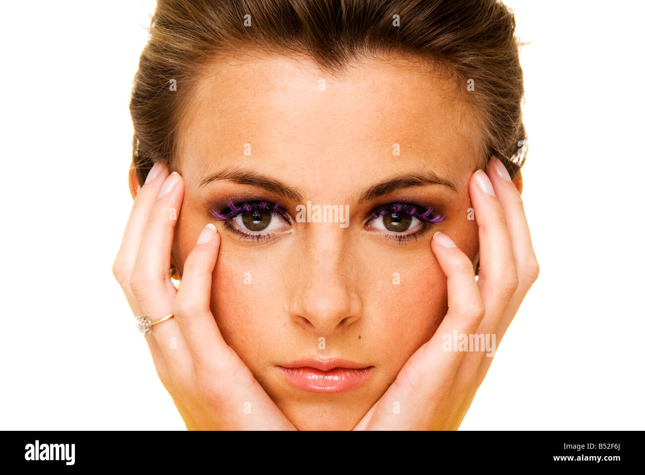 woman with her head cupped in her hands looking fed up Stock Photo - Alamy