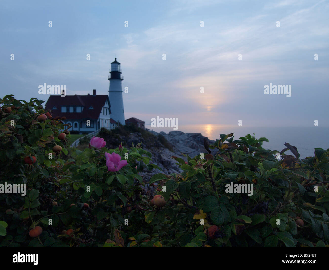 Fort Williams Lighthouse at sun rise in the early spring Stock Photo ...