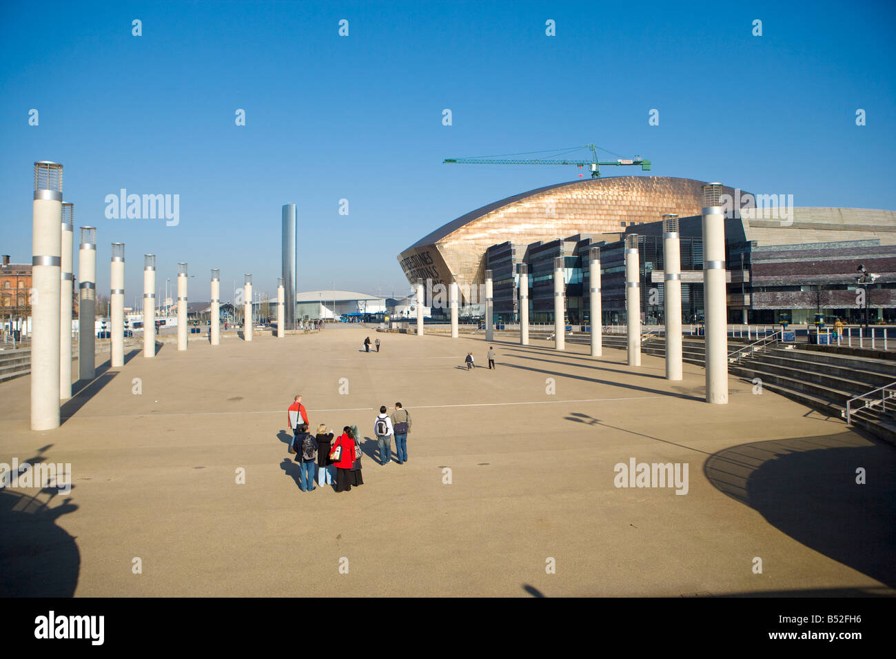 Cardiff Bay with the Welsh Millenium Centre. with tourists. Wales Stock ...