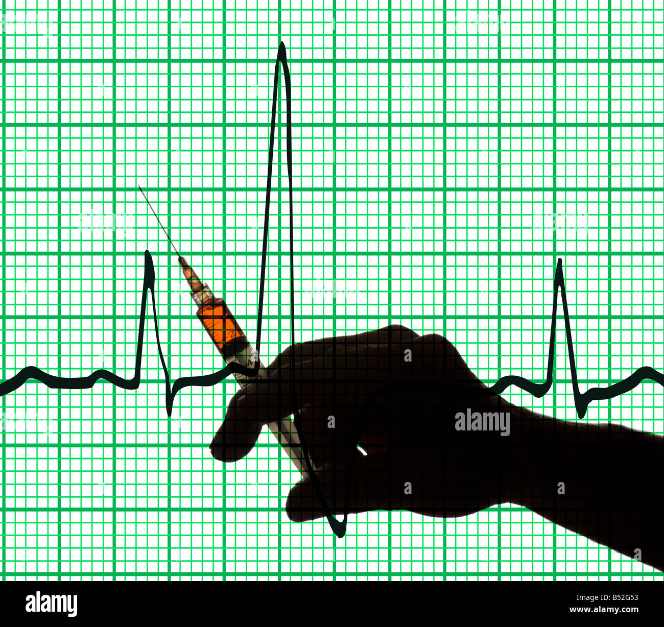 hand holding hypodermic needle with EKG electrocardiogram background ...
