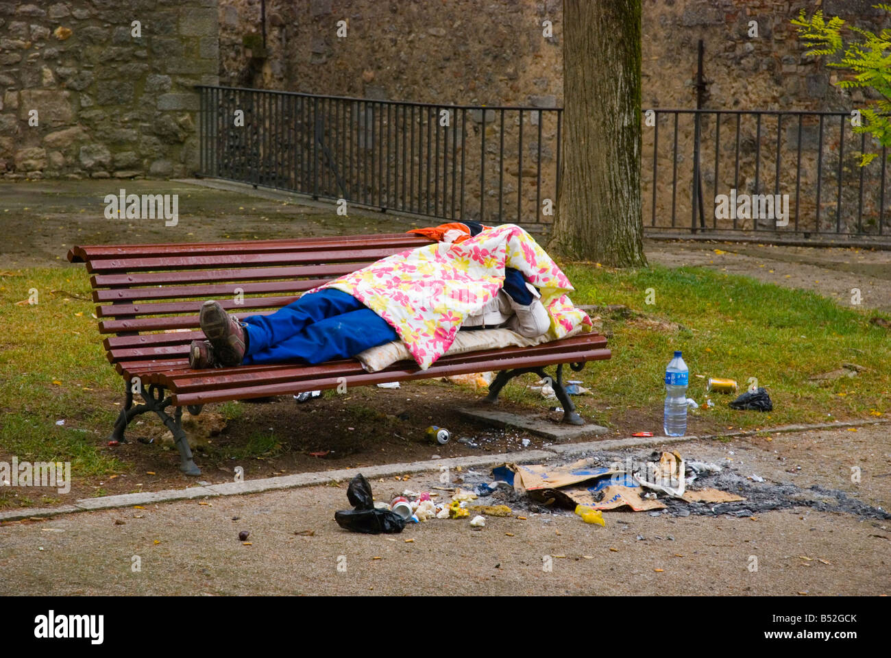 Sleeping rough on a bench hi-res stock photography and images - Alamy