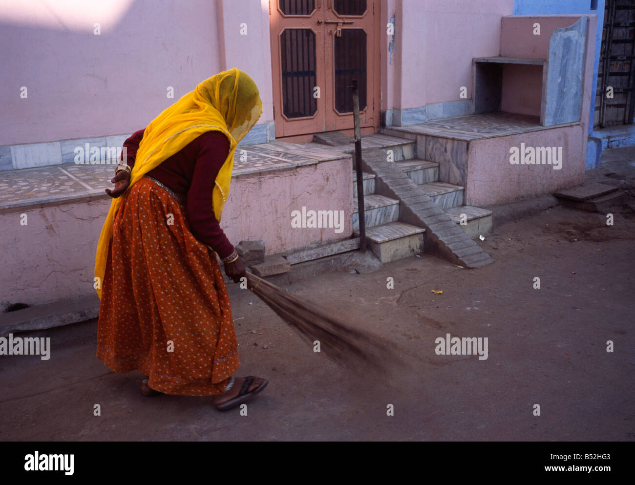 Indian women cleaning street hi-res stock photography and images - Alamy