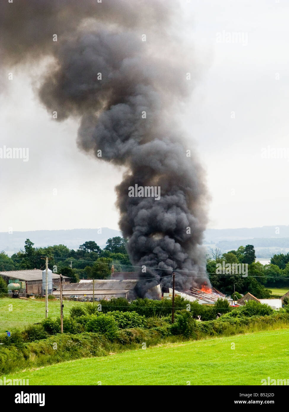 FIRE AND SMOKE IN BARN ON FARM GLOUCESTERSHIRE Stock Photo - Alamy