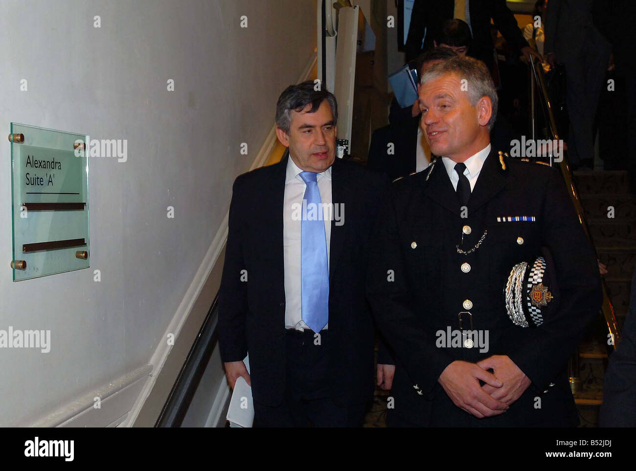 Gordon Brown is met by Greater Manchester Police Chief Constable ...