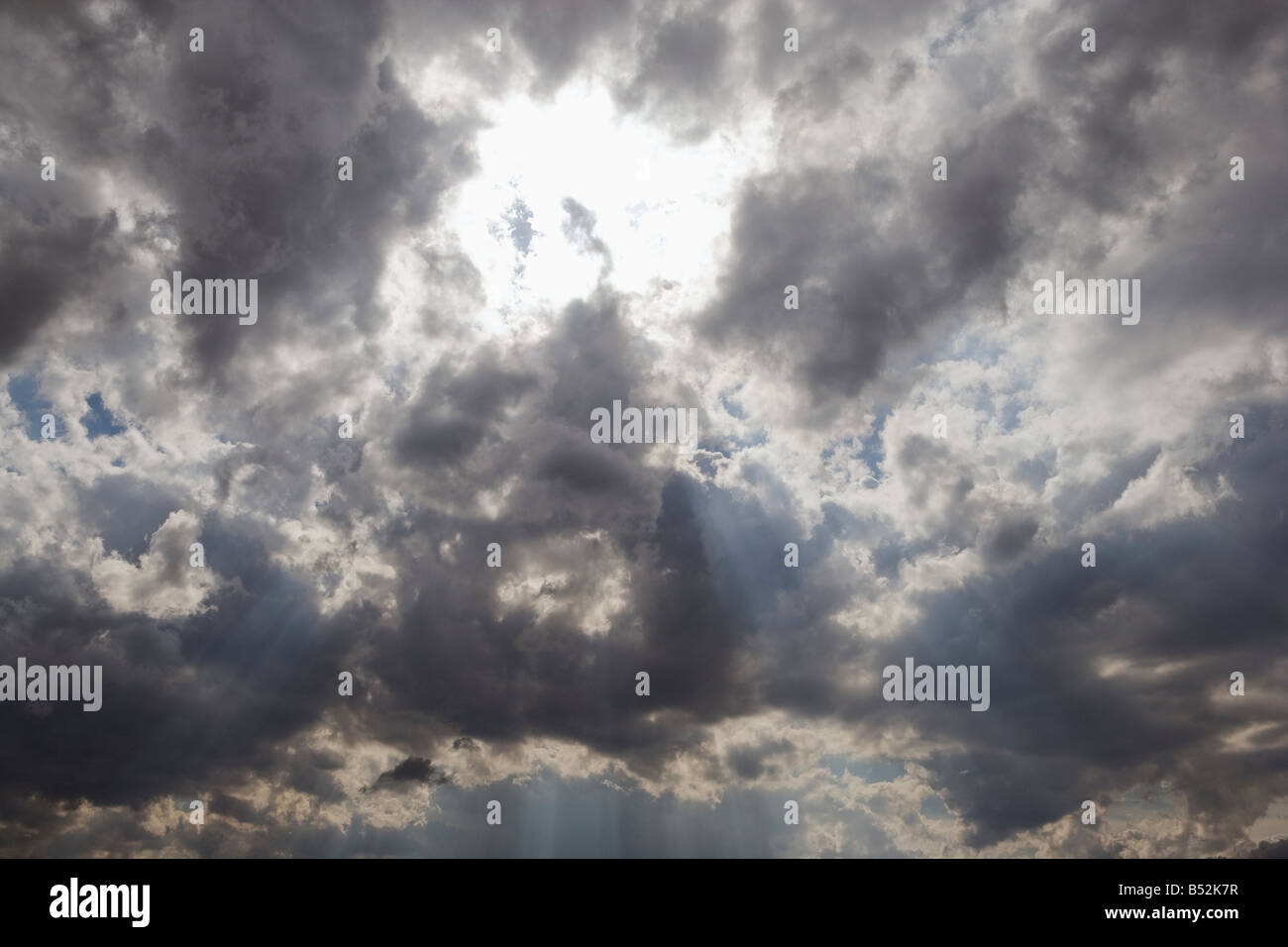 sun light shining through clouds Stock Photo - Alamy