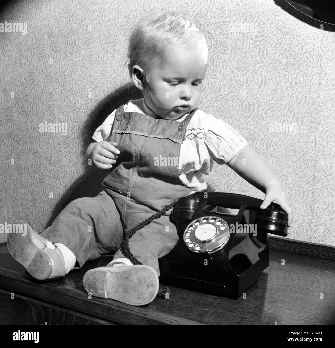 Child telephone 1950s hi-res stock photography and images - Alamy