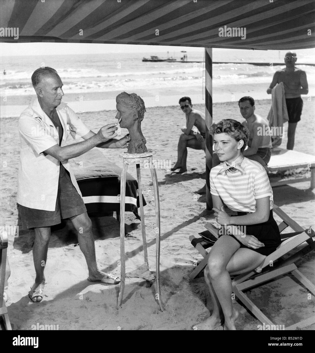 Actress Francis Farmer seen here having bust created on the beach near ...