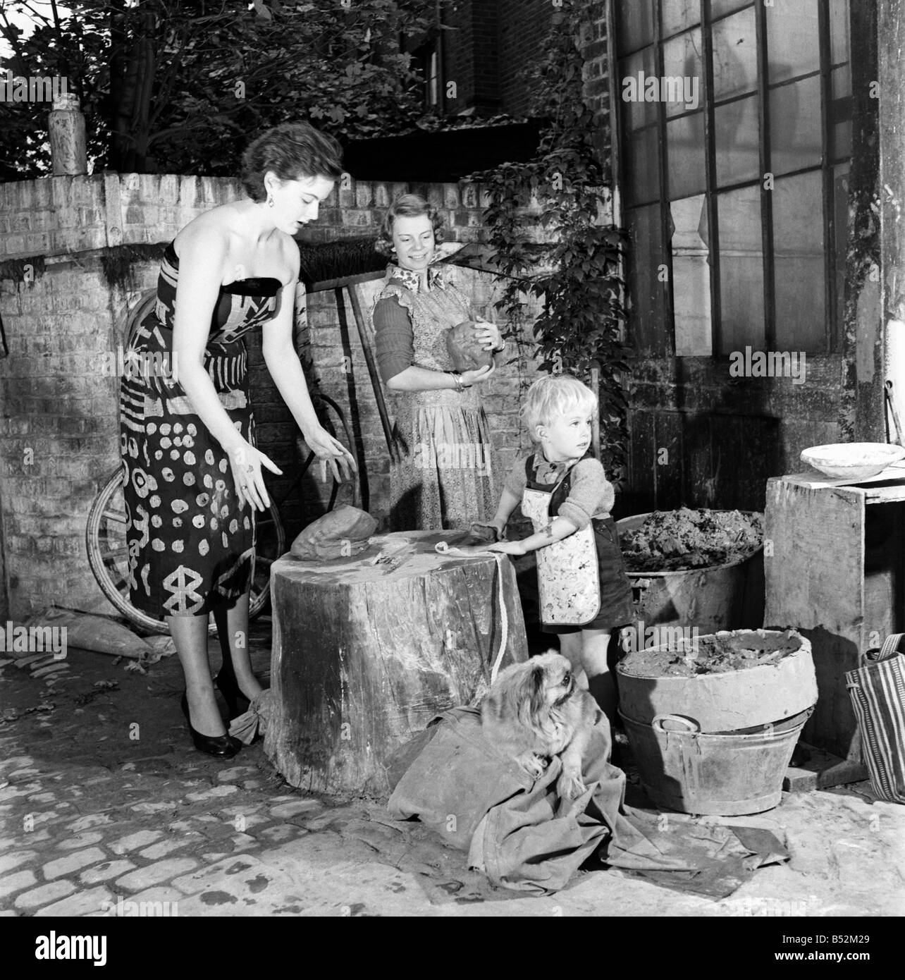 Children seen here playing with clay at David Rawnsley's Chelsea Studio ...
