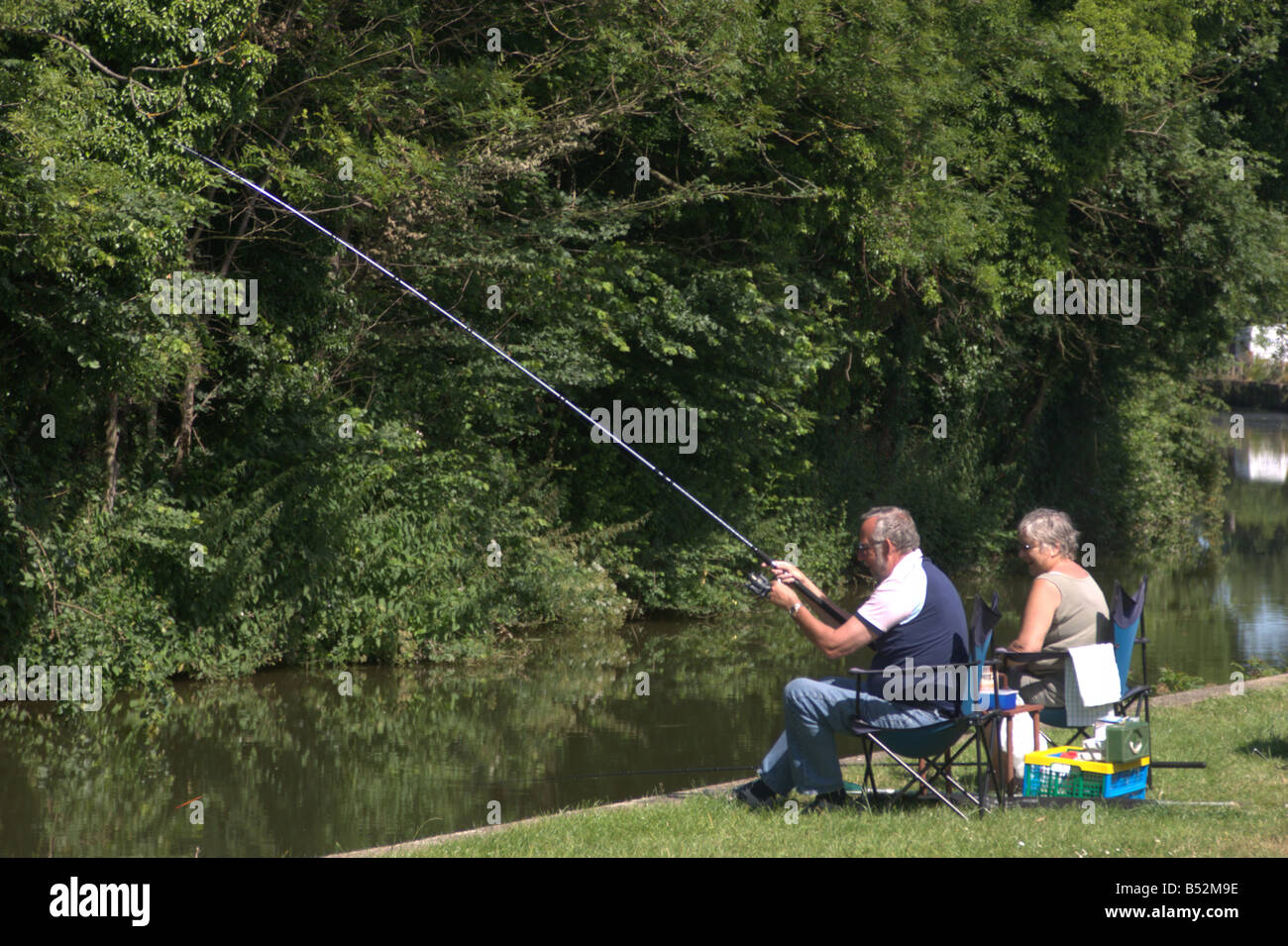 man woman husband wife fishing rod summers day hot river medway yalding ...