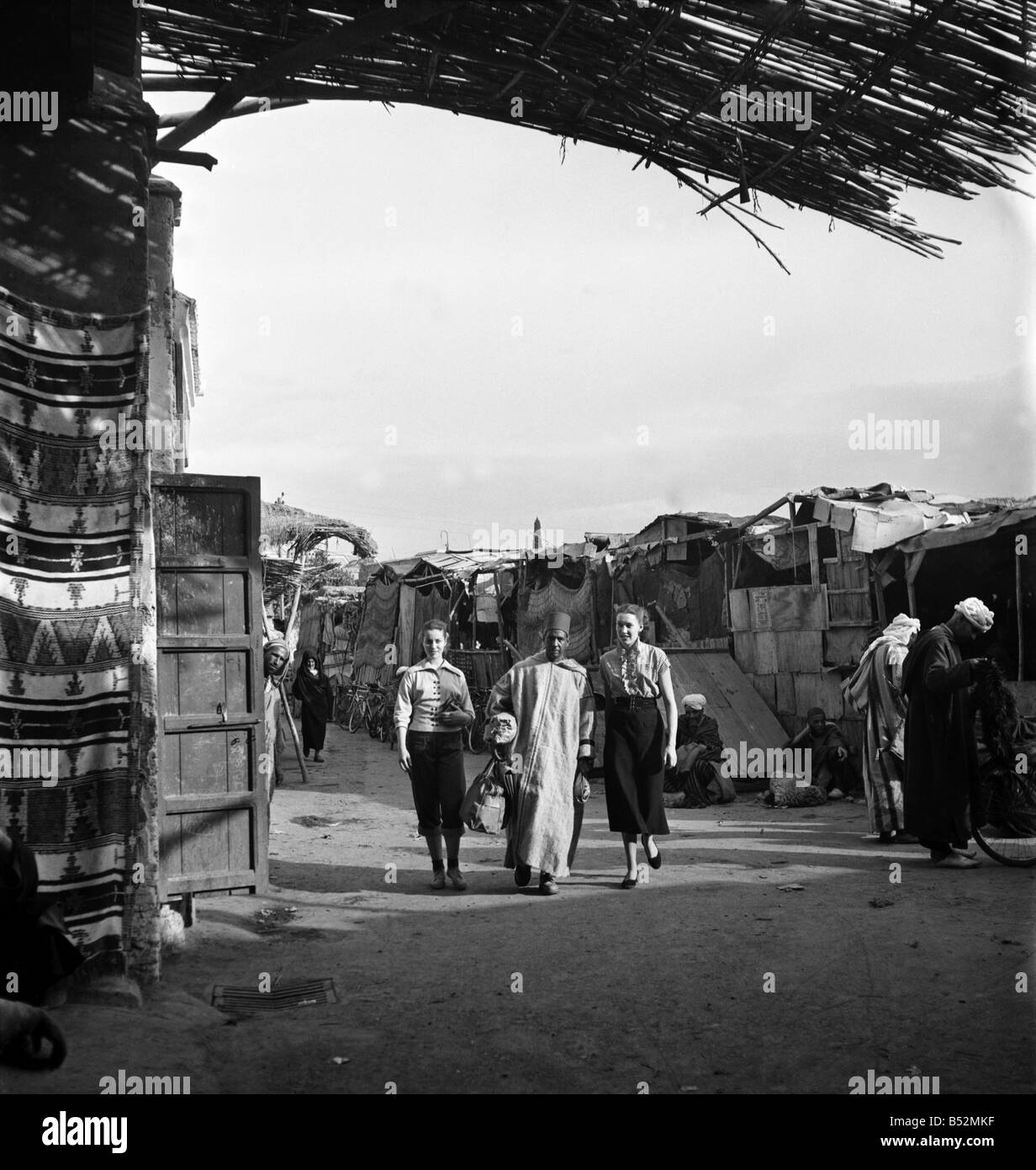 Actor Jeff Hunter on location with the Castand Crew of the film "The ...
