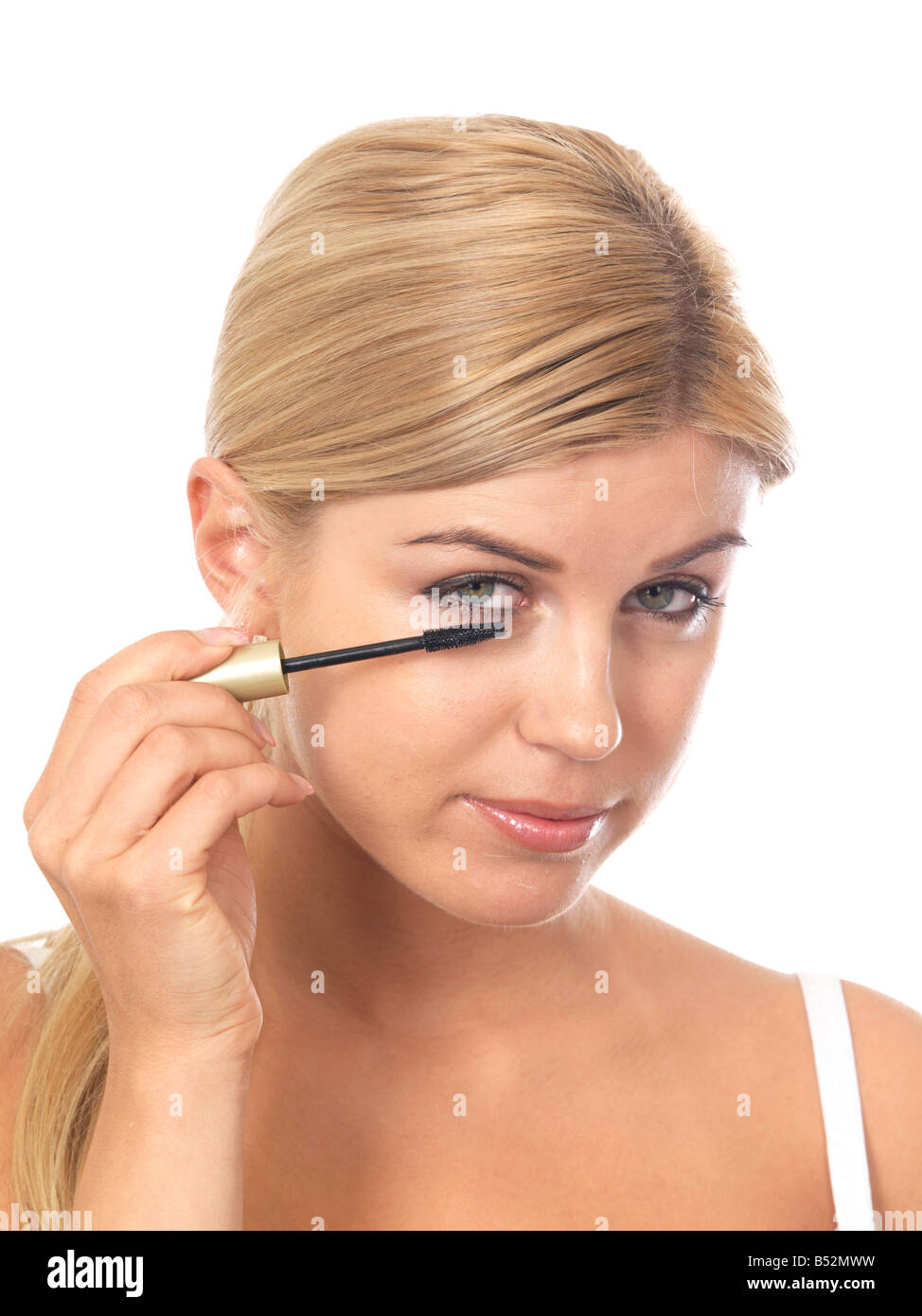 Young Woman Applying Mascara Model Released Stock Photo - Alamy