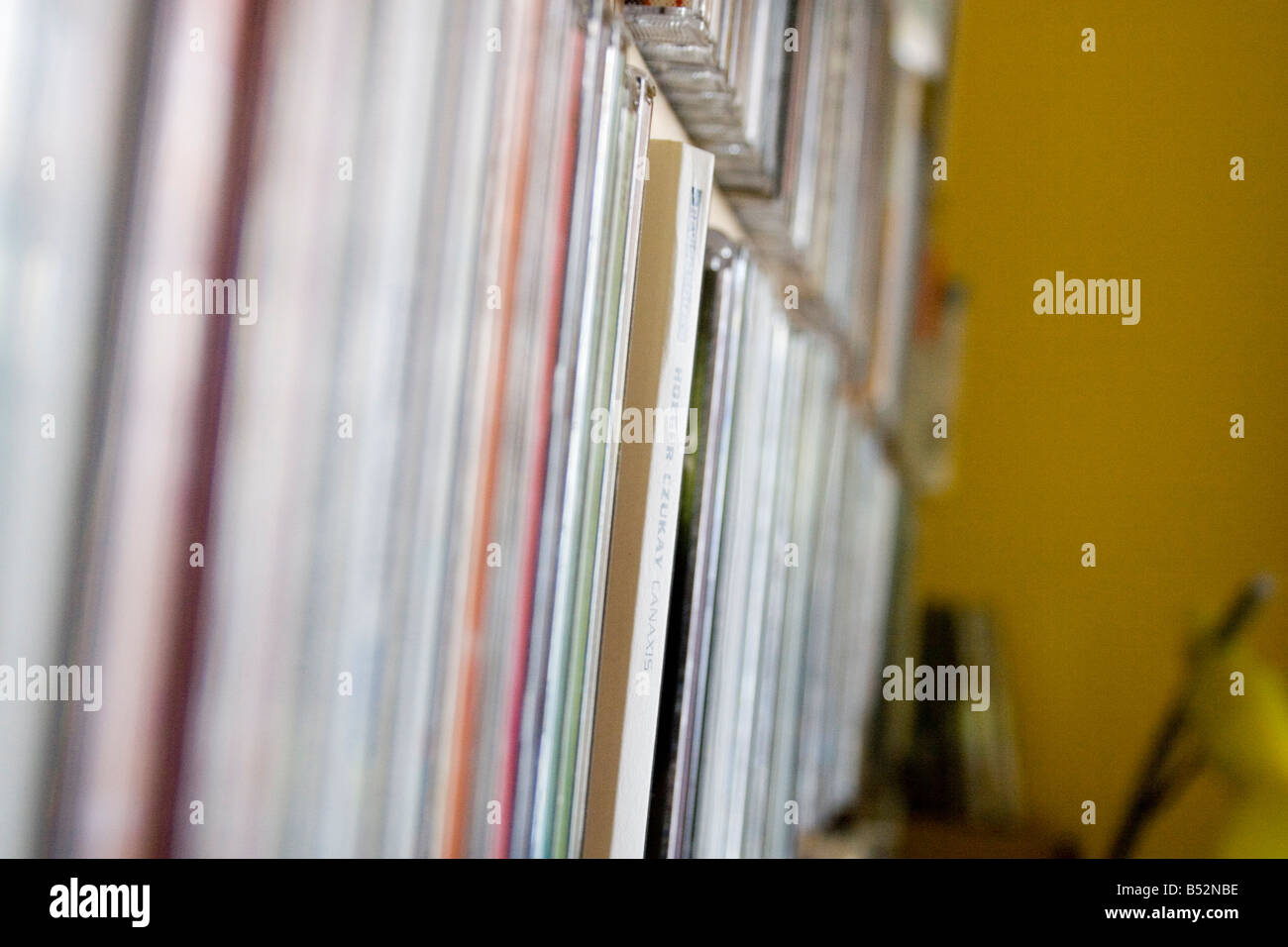 Music CD collection stacked on shelves Stock Photo - Alamy