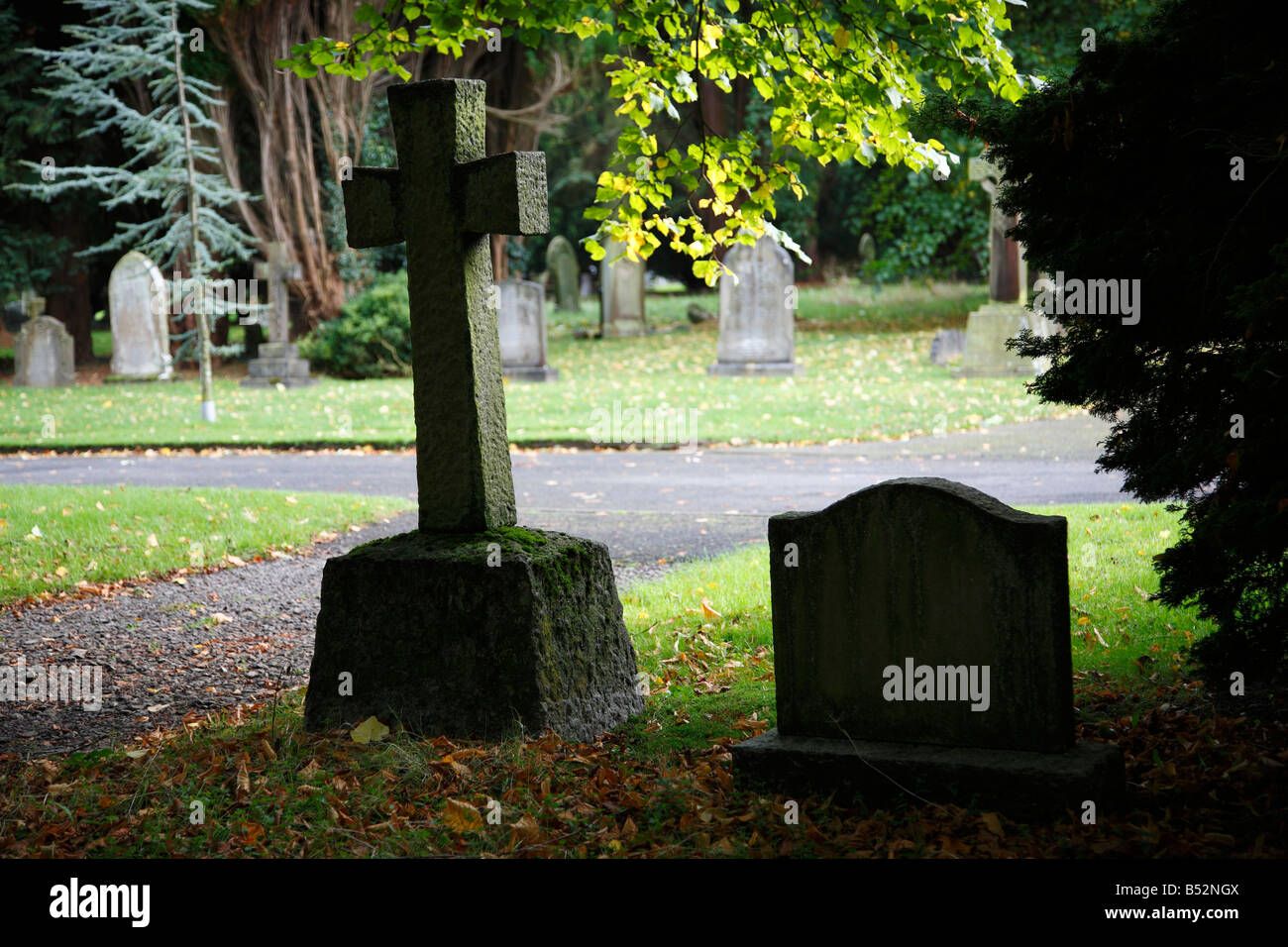 Cross at cemetery hi-res stock photography and images - Alamy
