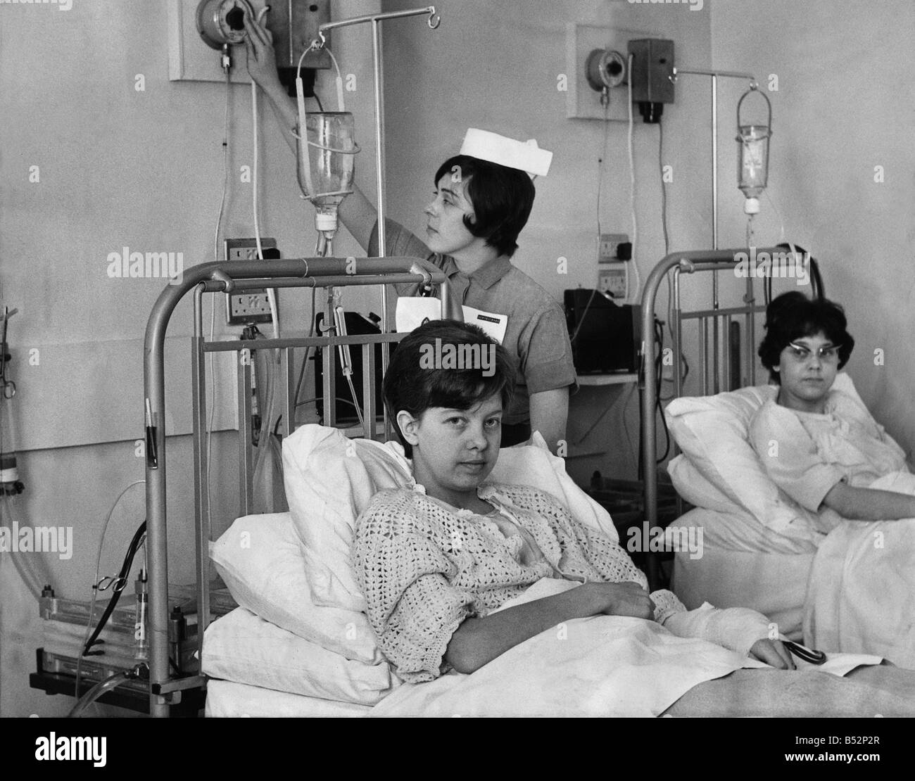 Medical hospital occupations nurses bed patients 1960s hi-res stock ...