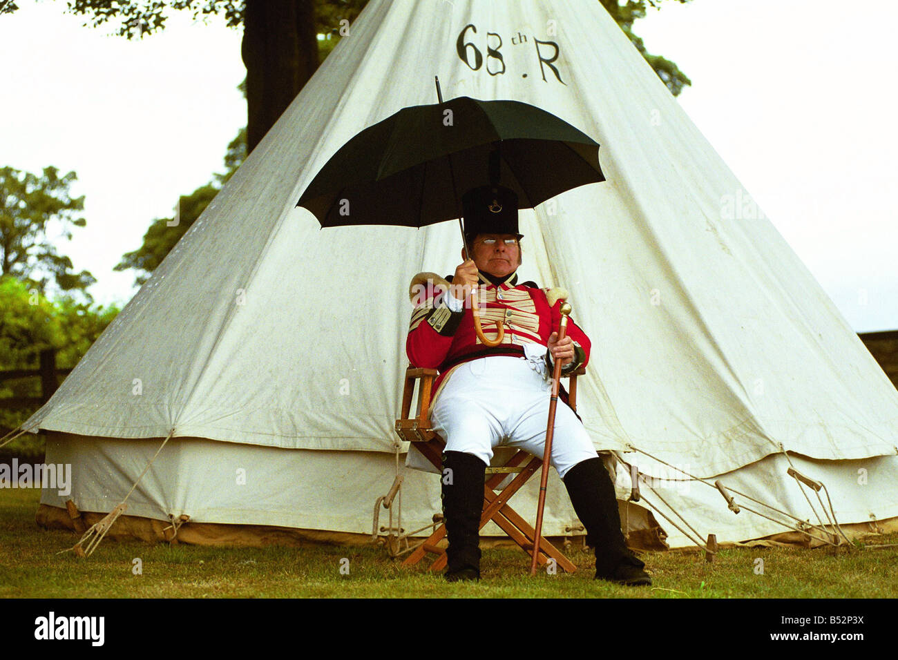 Sgt Jeff Peacock of the 68th Regiment of Light Infantry shelters from a ...