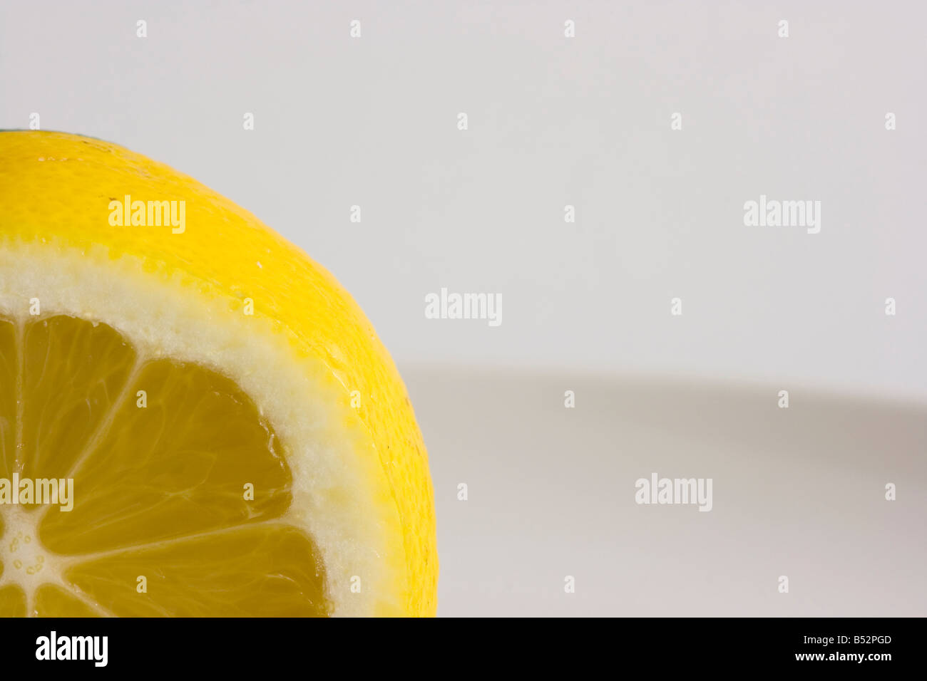 Lemon on a plate Still Life Stock Photo - Alamy