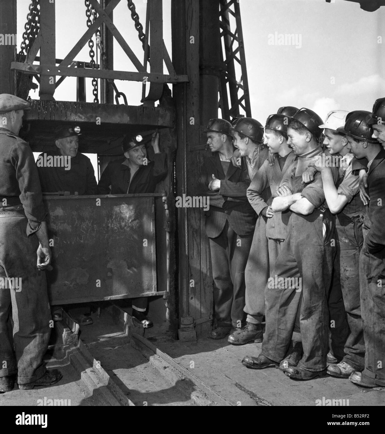 Henry Price MP Vists a coal mine. Workers above ground in the cart ...