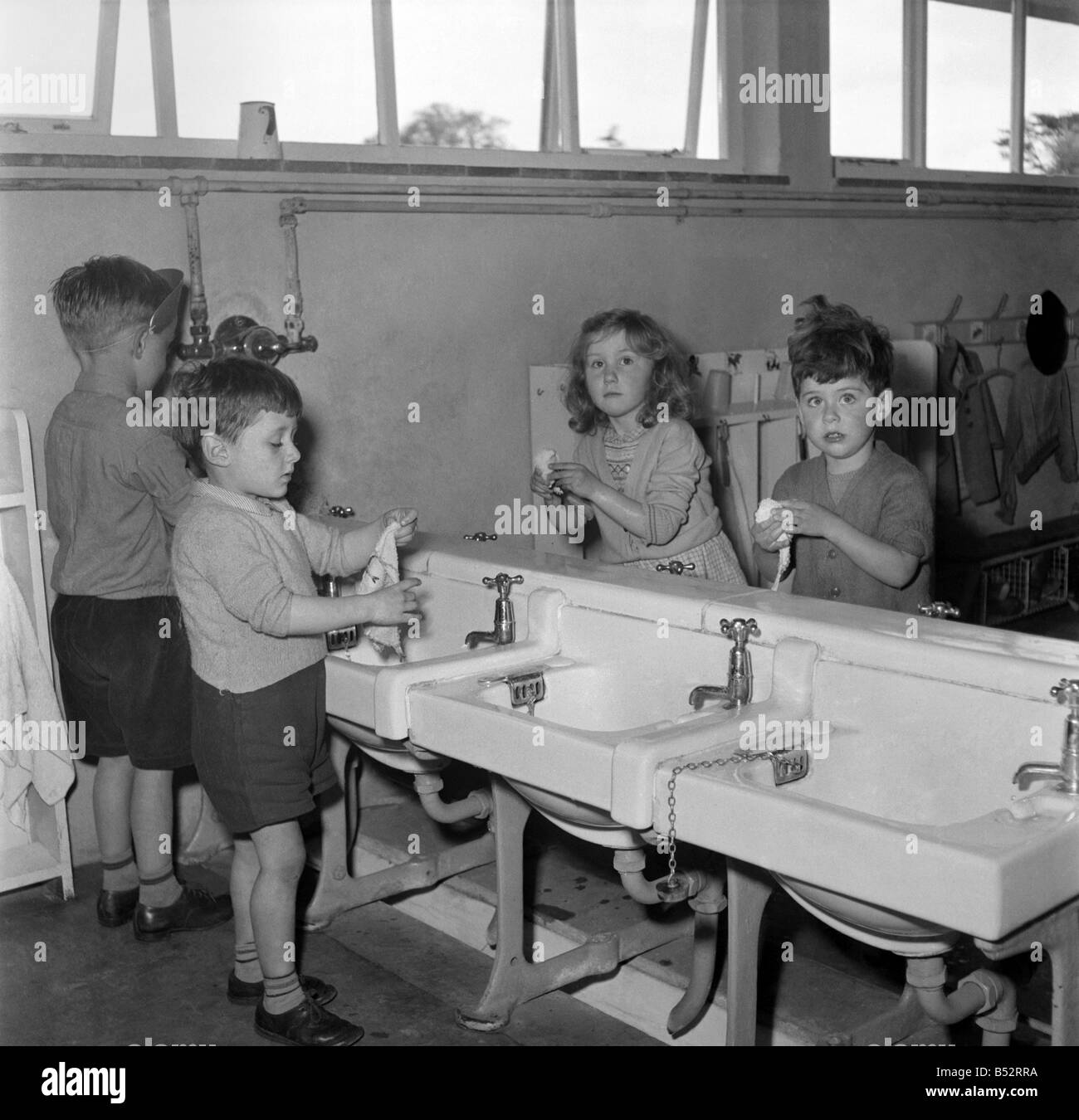 Children washing their hands before class at Cookham Nursery School ...
