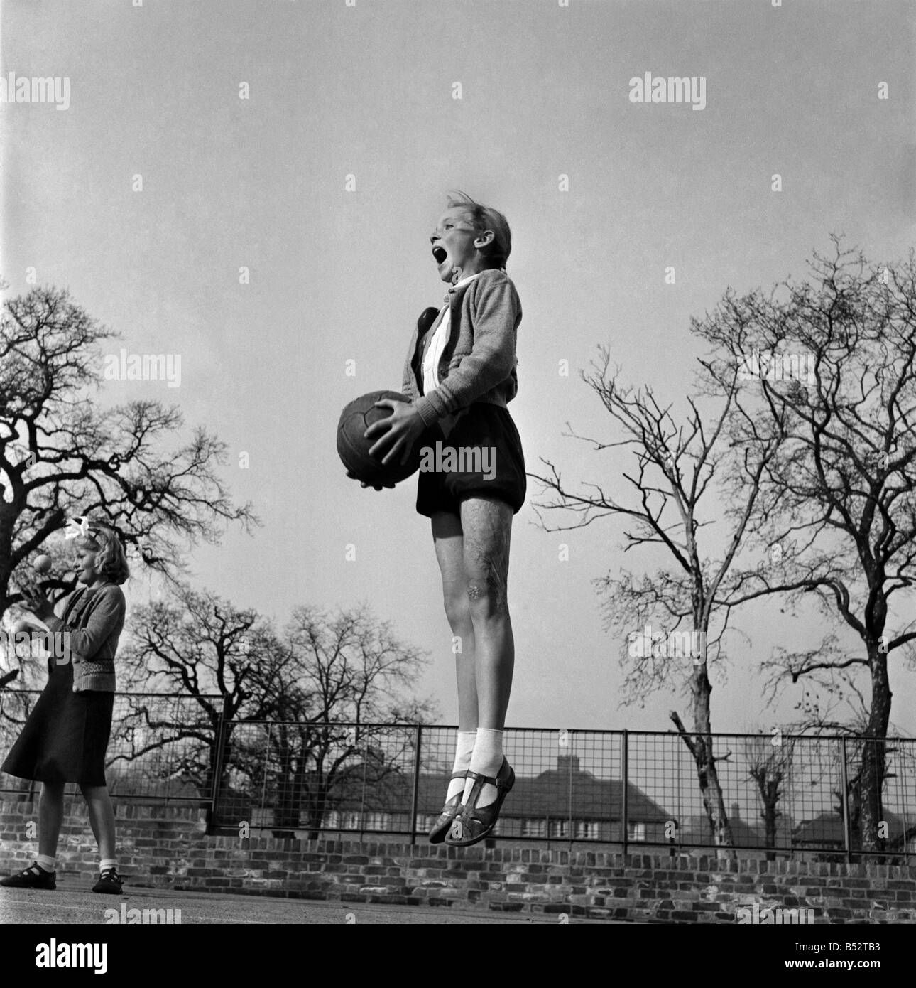Playing netball Black and White Stock Photos & Images - Alamy