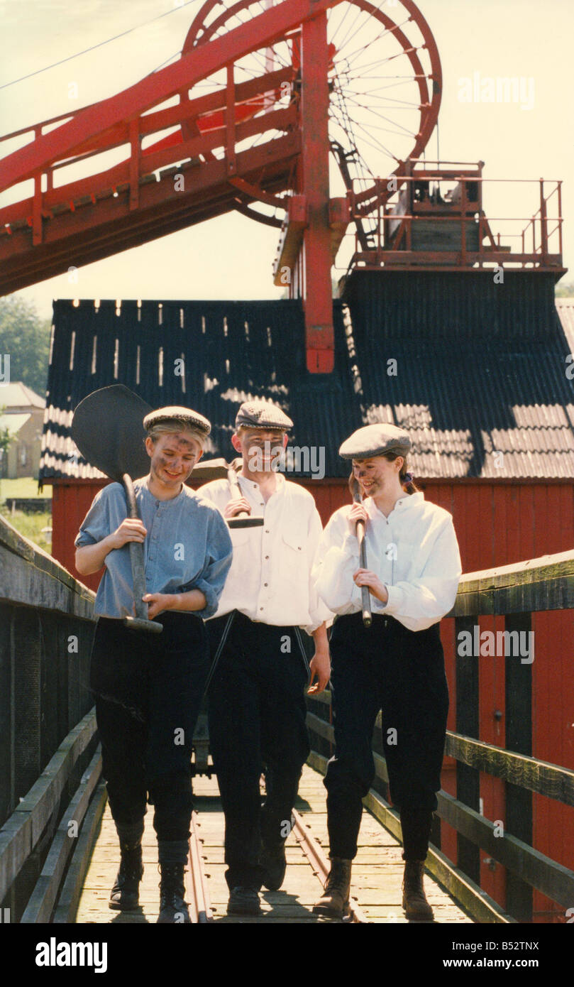 Some young people dressed as miners at Beamish Museum Stock Photo - Alamy