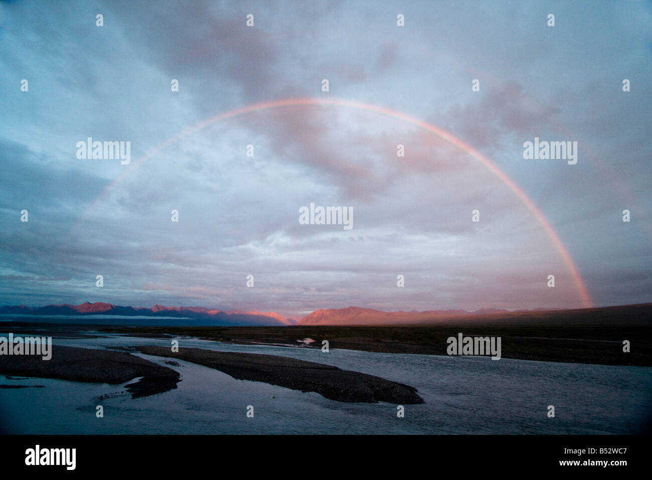 A rainbow shines over the Canning River in ANWR. Summer in Arctic ...