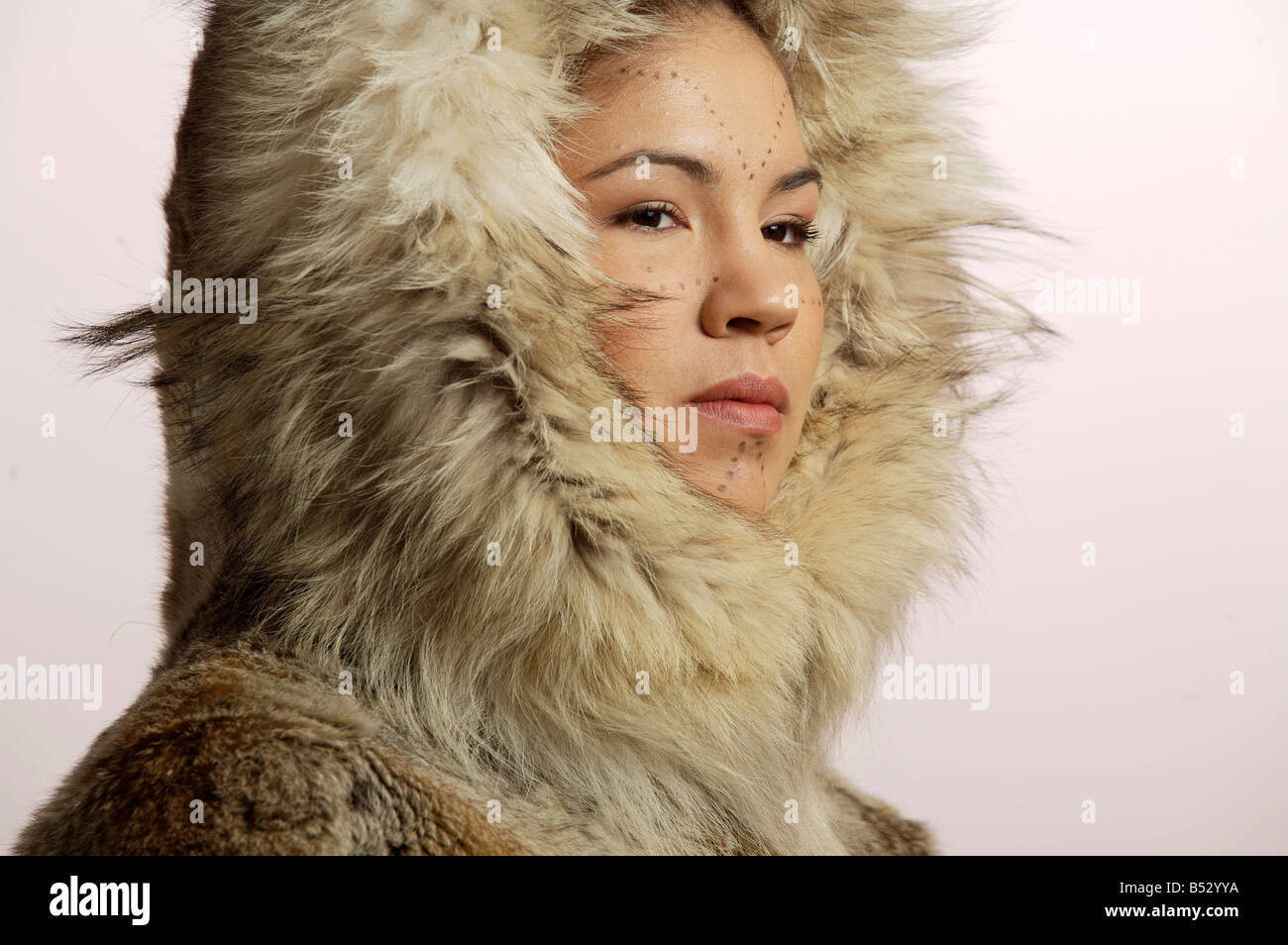 Portrait of Native Alaskan Inupiat Woman in Wolf Fur Coat in Studio ...