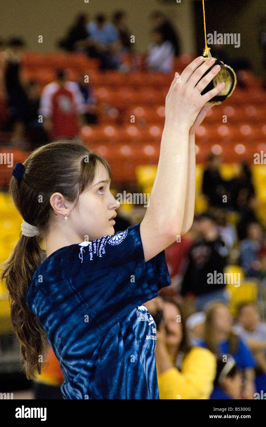 Girl holding ball for One Hand Reach 2006 Senior Native Youth Olympic ...
