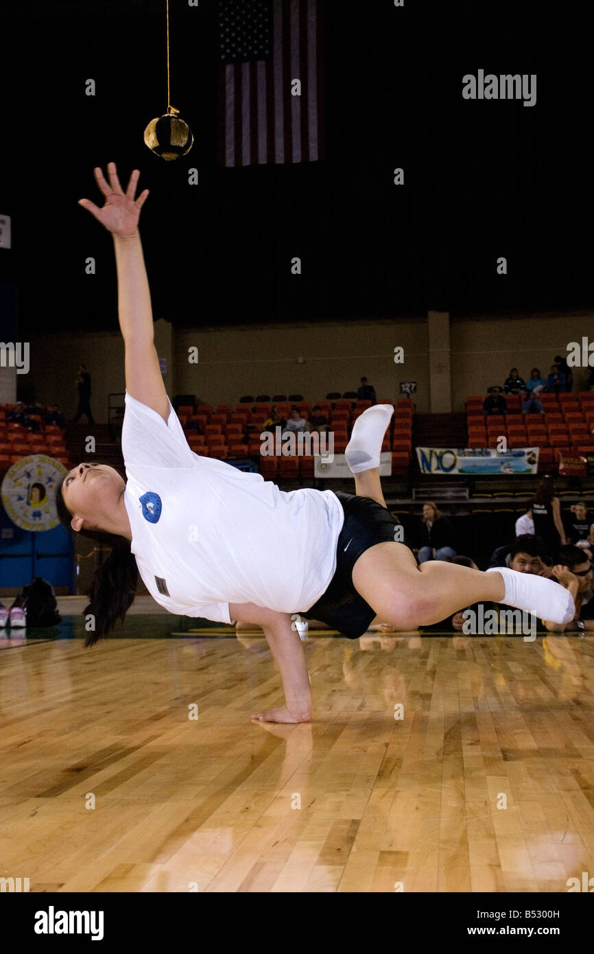 Girl doing One Hand Reach 2006 Senior Native Youth Olympic Games Alaska ...