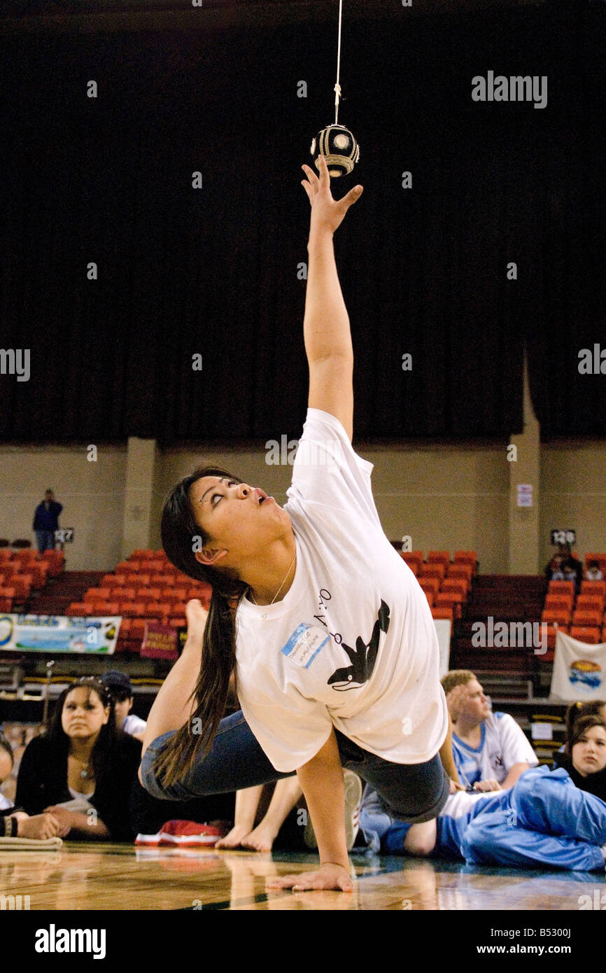 Girl doing One Hand Reach 2006 Senior Native Youth Olympic Games Alaska ...