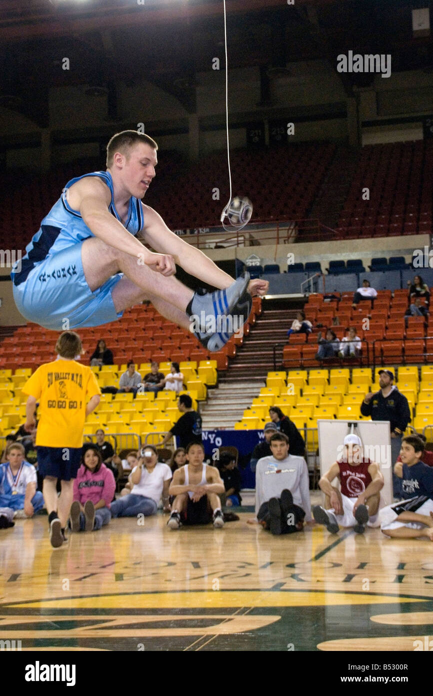 Boy doing Two-Foot High Kick 2006 Senior Native Youth Olympic Games ...