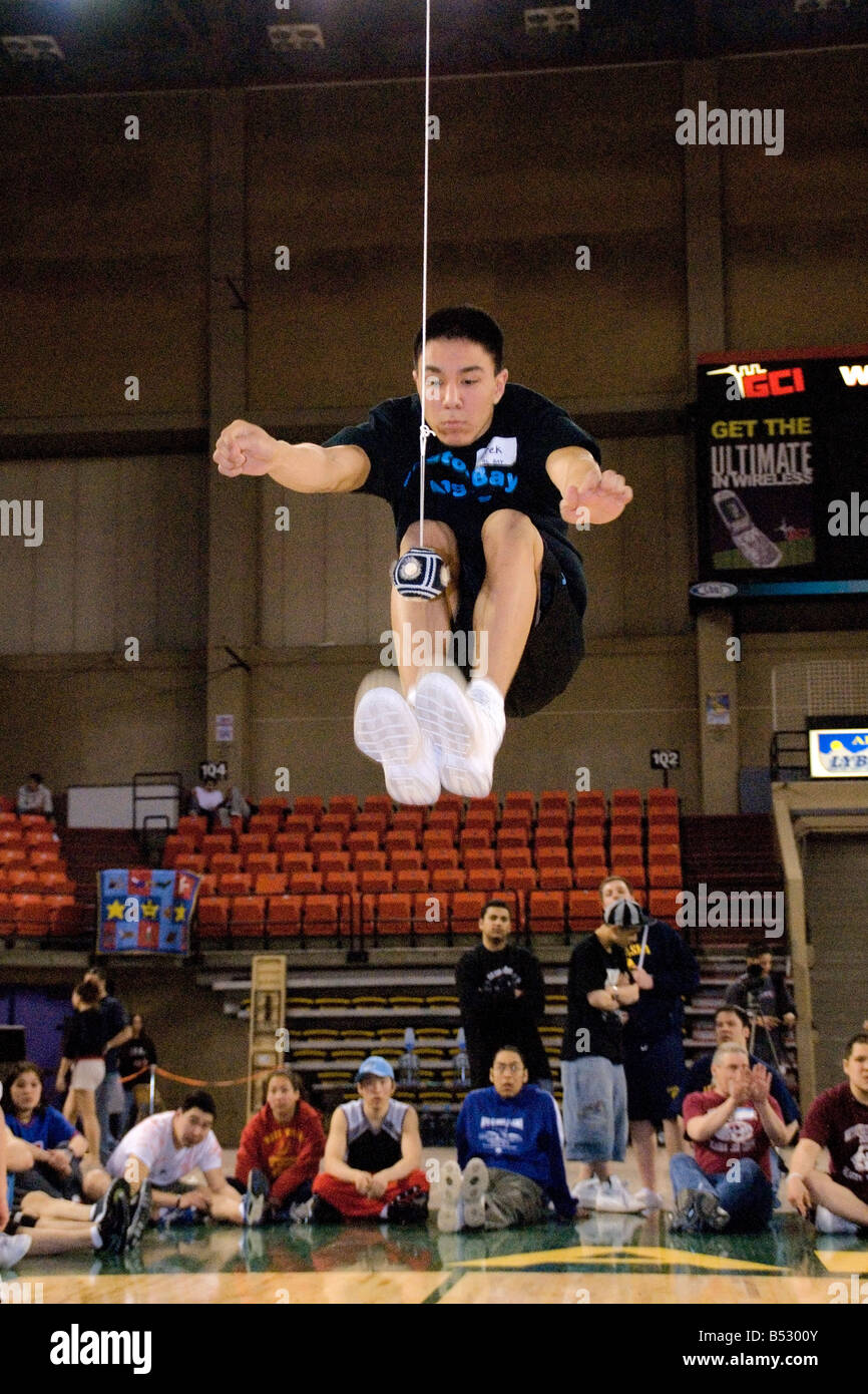 Boy doing Two-Foot High Kick 2006 Senior Native Youth Olympic Games ...