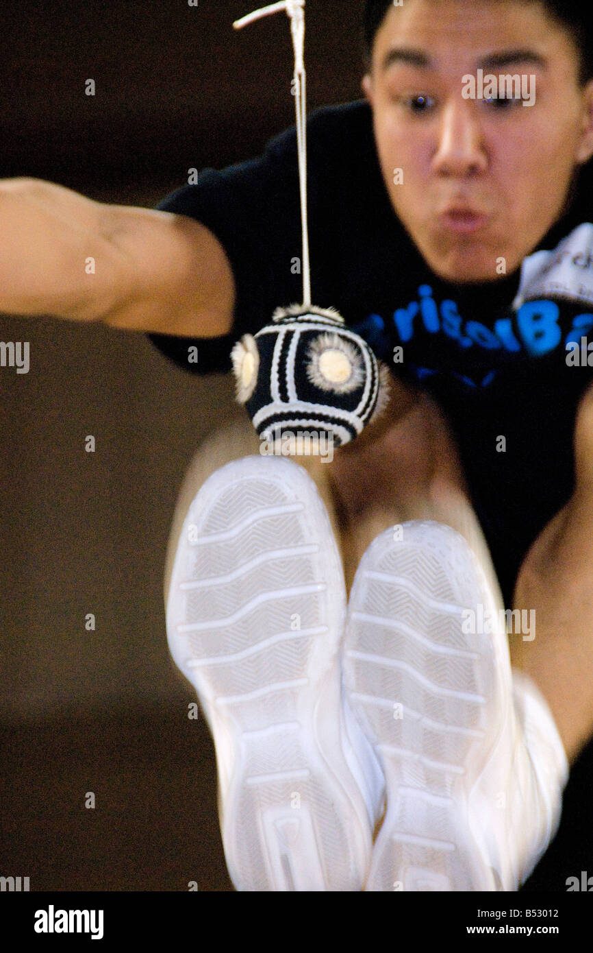 Boy doing Two-Foot High Kick 2006 Senior Native Youth Olympic Games ...
