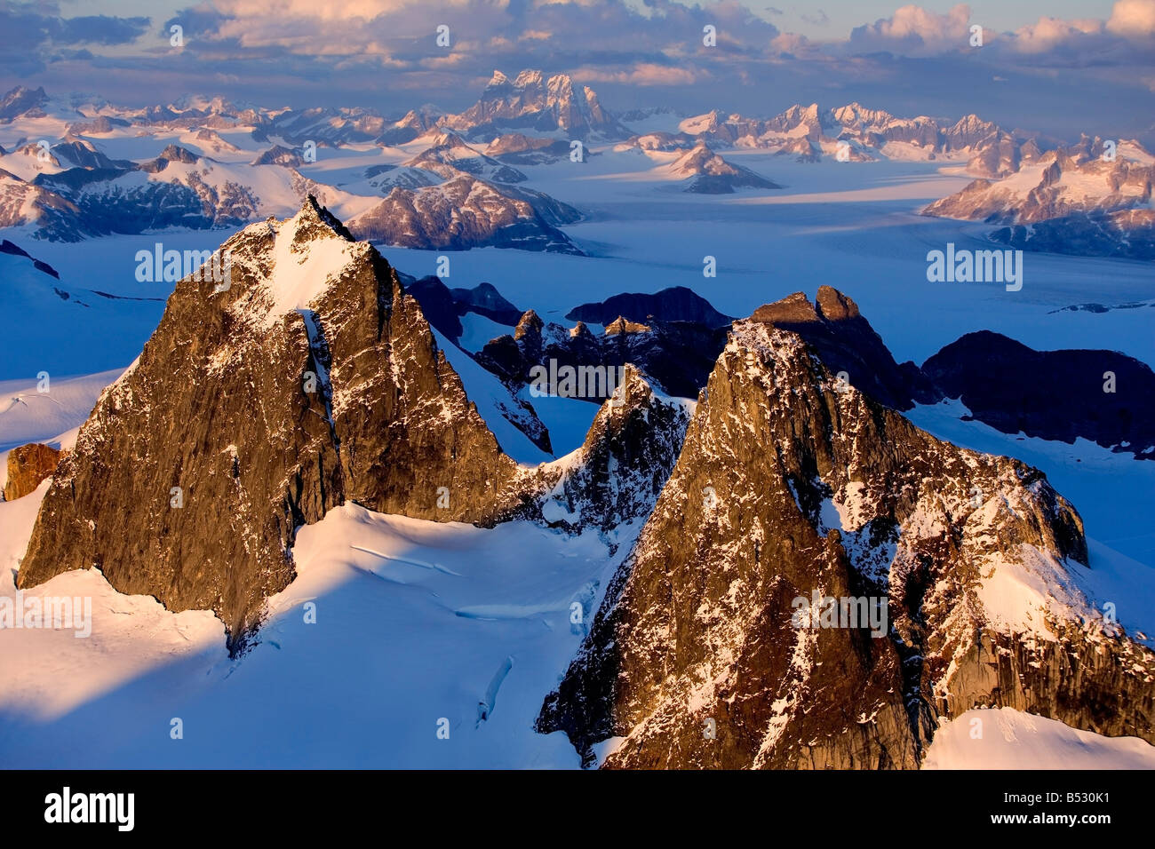 Aerial view of Juneau Ice Field bathed in evening light, looking past ...