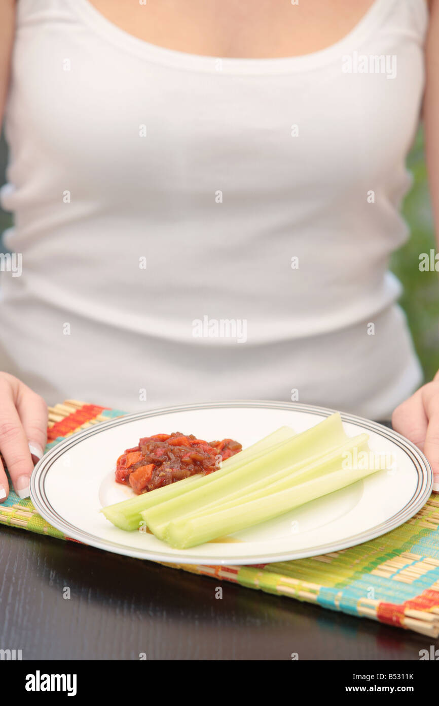Woman celery dip hi-res stock photography and images - Alamy