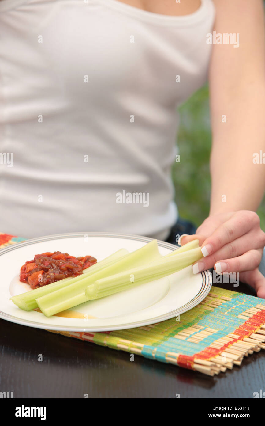 Woman celery dip hi-res stock photography and images - Alamy