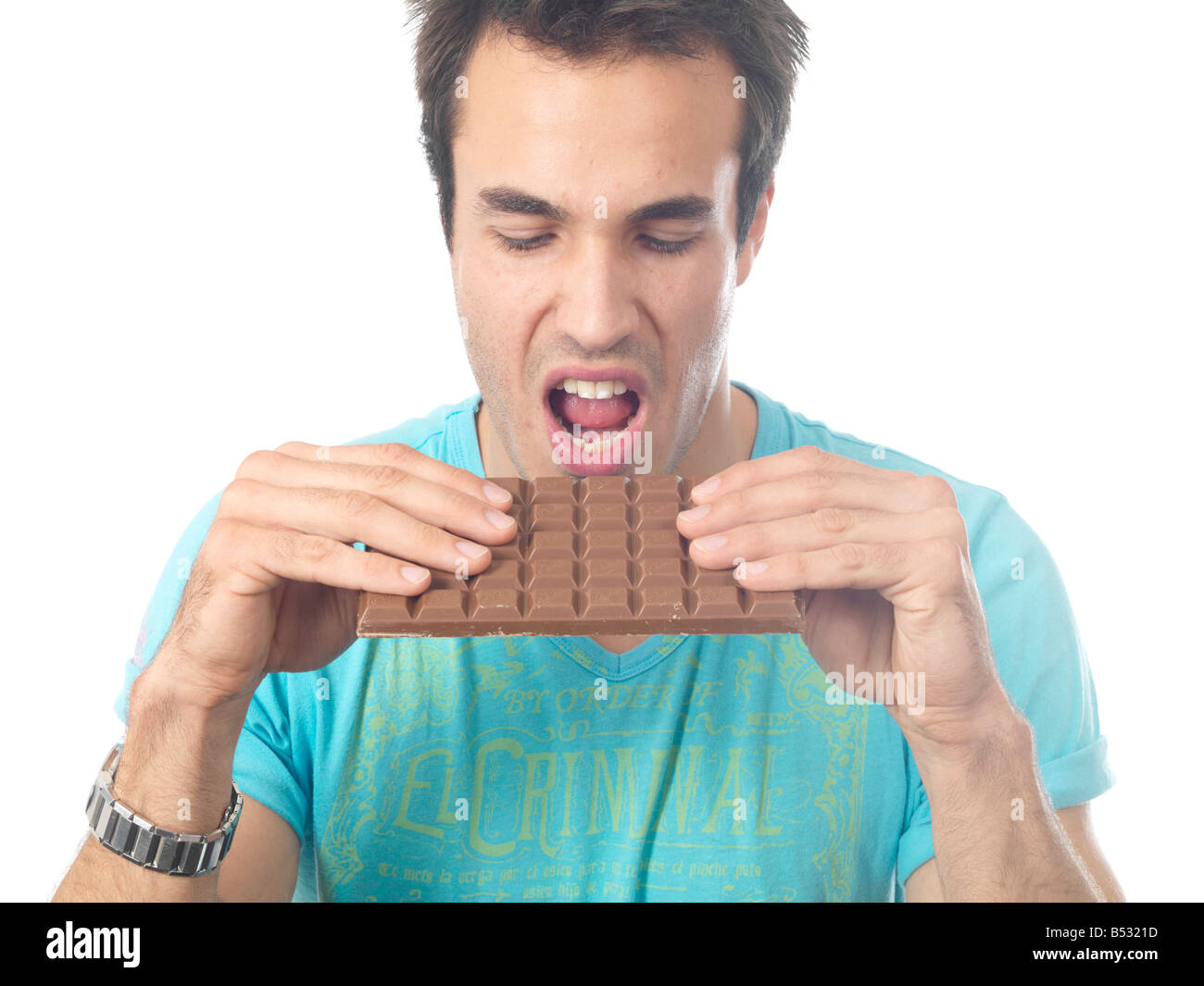 Young Man Eating Bar of Chocolate Model Released Stock Photo - Alamy