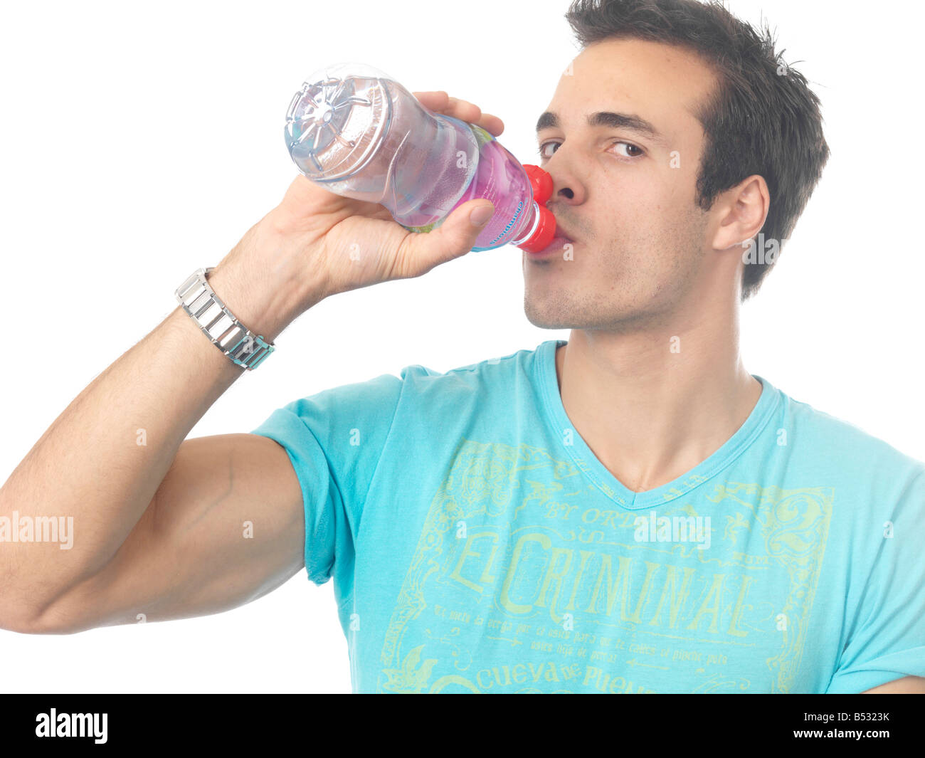 Young Man Drinking From A Bottle Model Released Stock Photo - Alamy