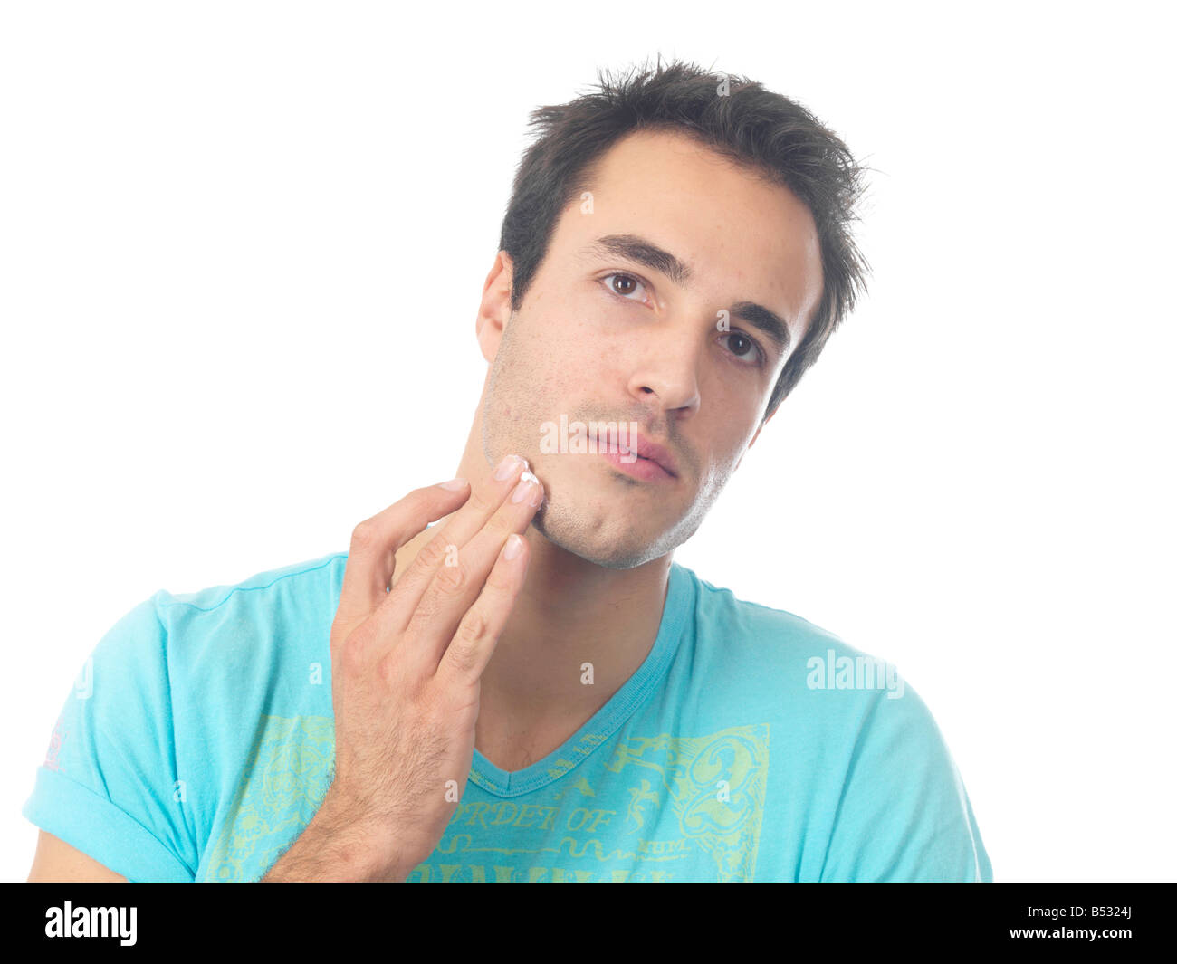 Young Man Applying Moisturiser Model Released Stock Photo - Alamy