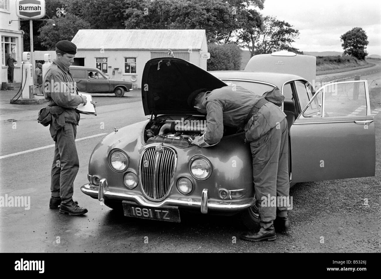 Soldiers carry out a search for weapons and explosives at the army ...