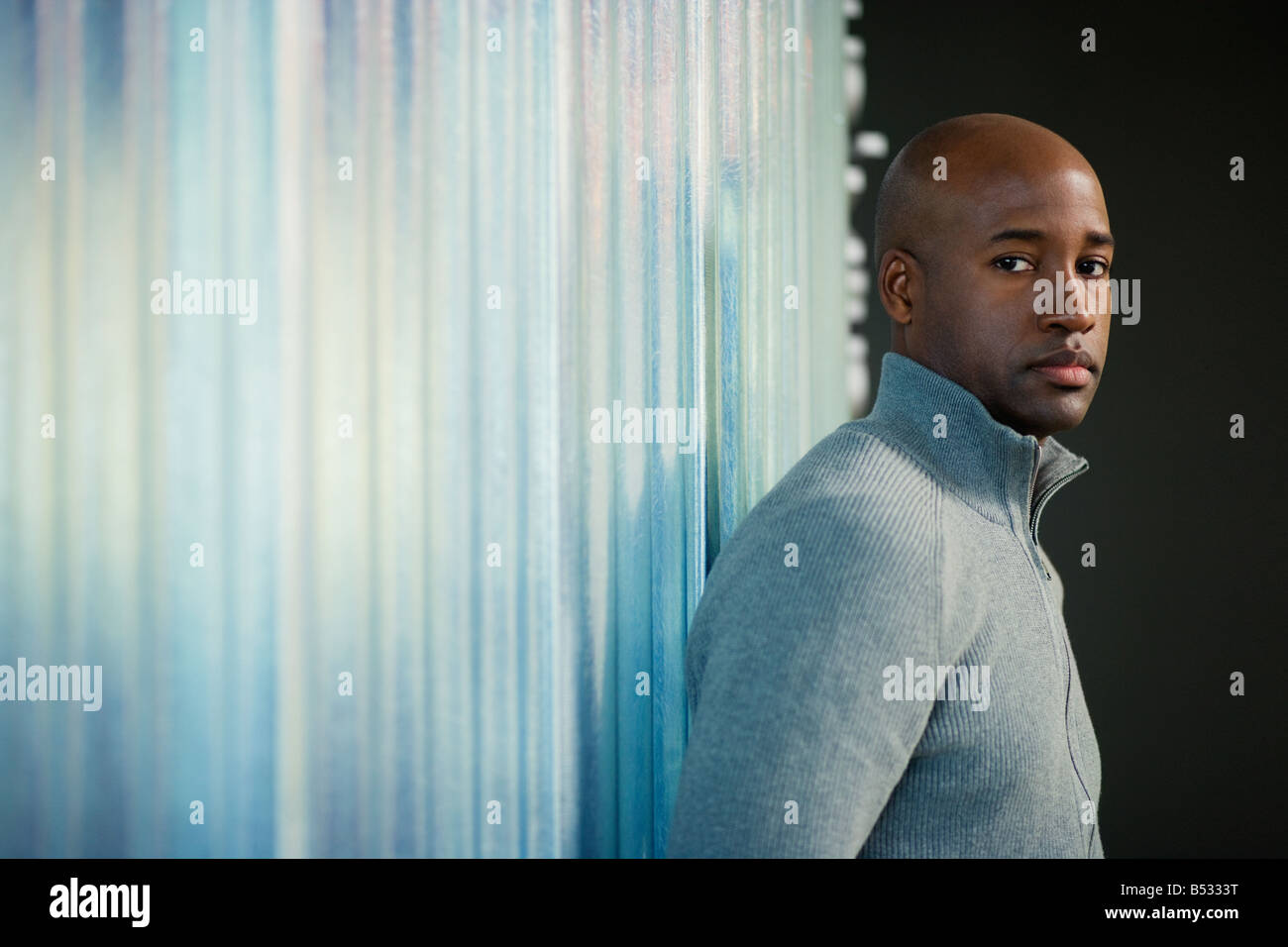 African man looking serious Stock Photo - Alamy