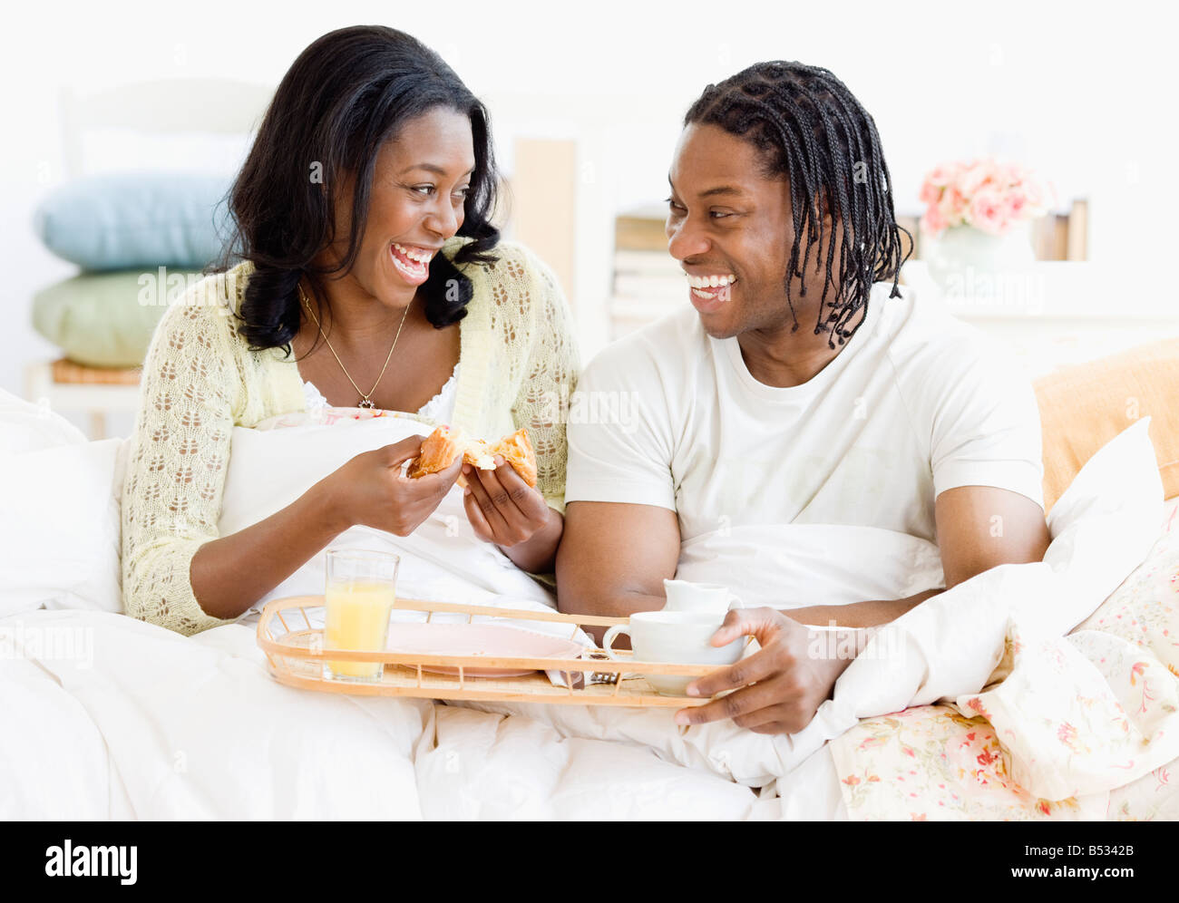 African couple eating breakfast hi-res stock photography and images - Alamy