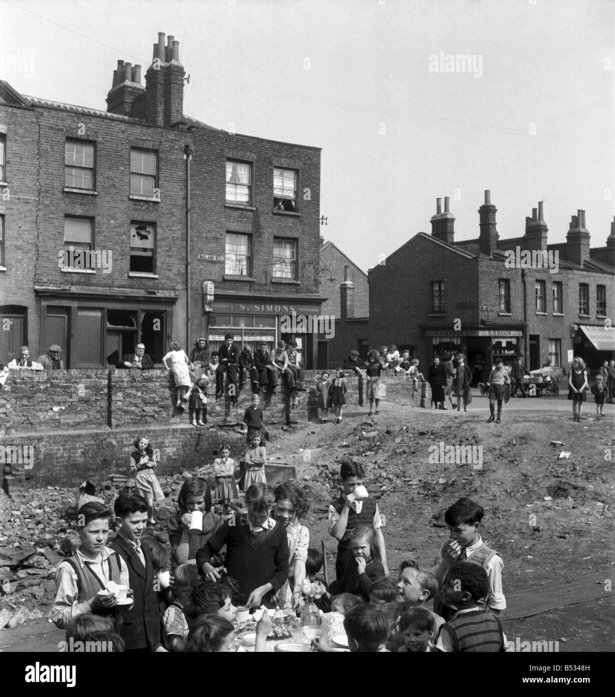 Party on bomb site at Anthony street, in London's East end. April 1952 ...