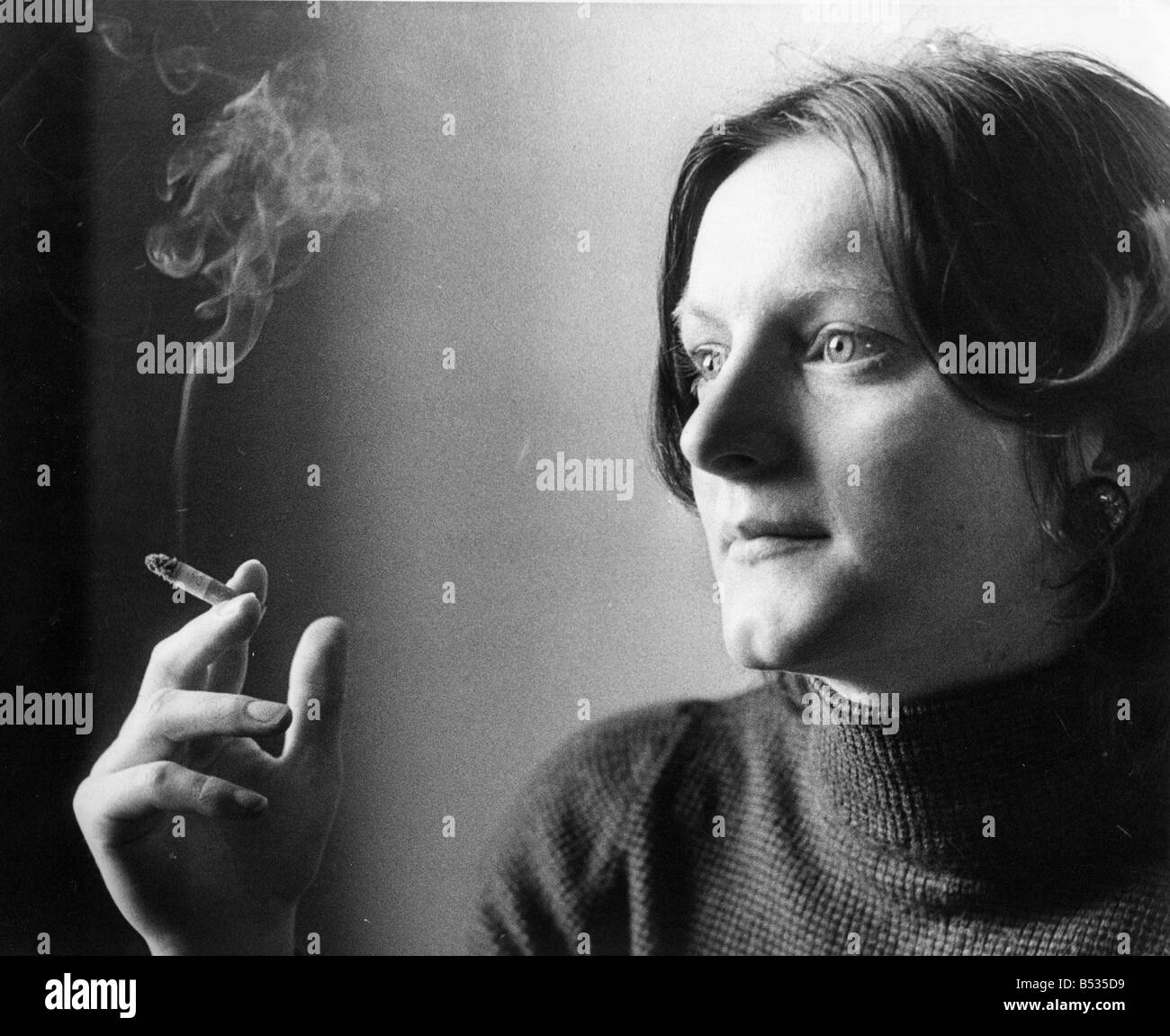 Psychology student Adrianne Little smoking a cigarette Stock Photo - Alamy