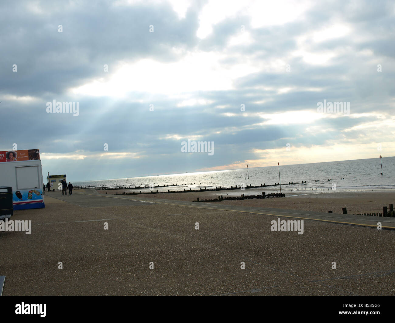 Sunbeams showing through the clouds on the promenade at Hunstanton ...