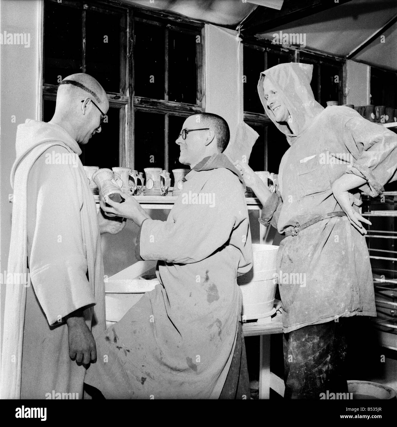 Raising three mugs and clearing three throats three jolly monks toast ...