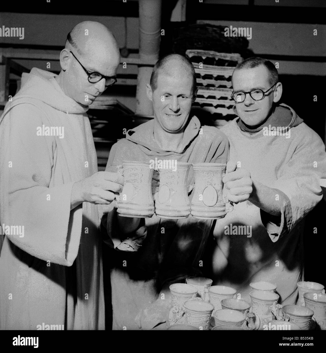 Raising three mugs and clearing three throats three jolly monks toast ...